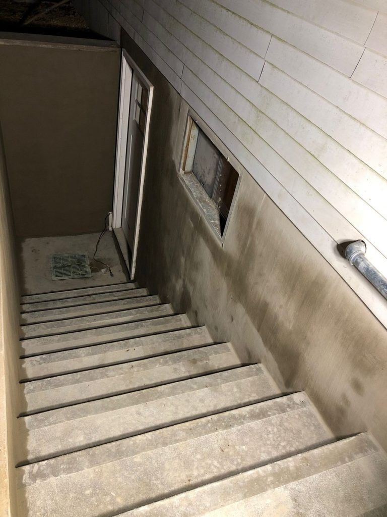 Egress window and walkout steps with pumps completed in Toms River NJ