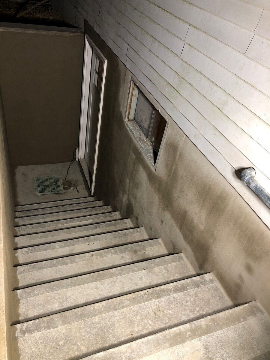 Egress window and walkout steps with pumps completed in Toms River NJ