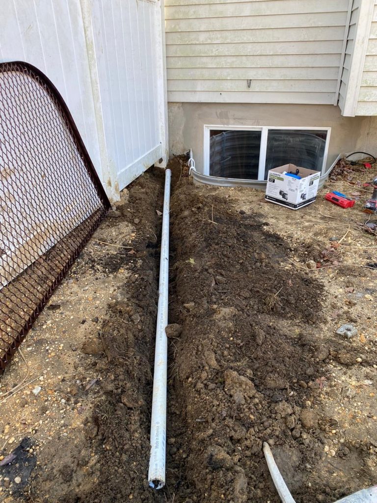 Egress window and walkout steps with pumps completed in Toms River NJ