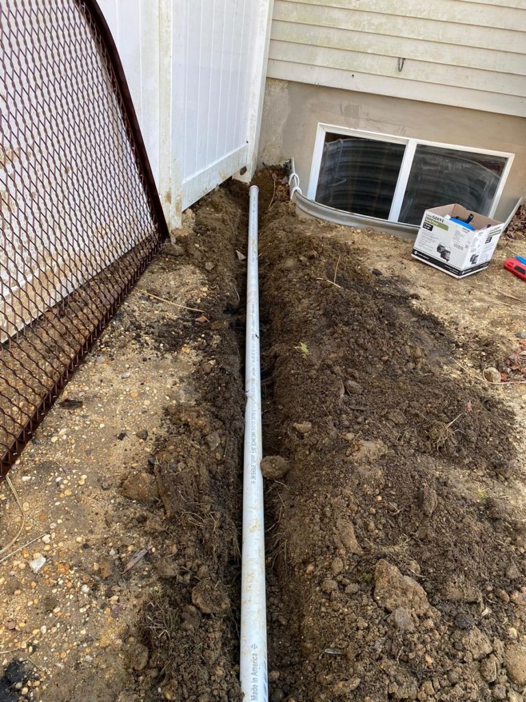 Egress window and walkout steps with pumps completed in Toms River NJ