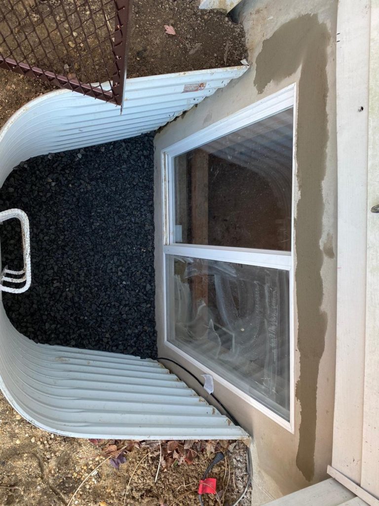 Egress window and walkout steps with pumps completed in Toms River NJ