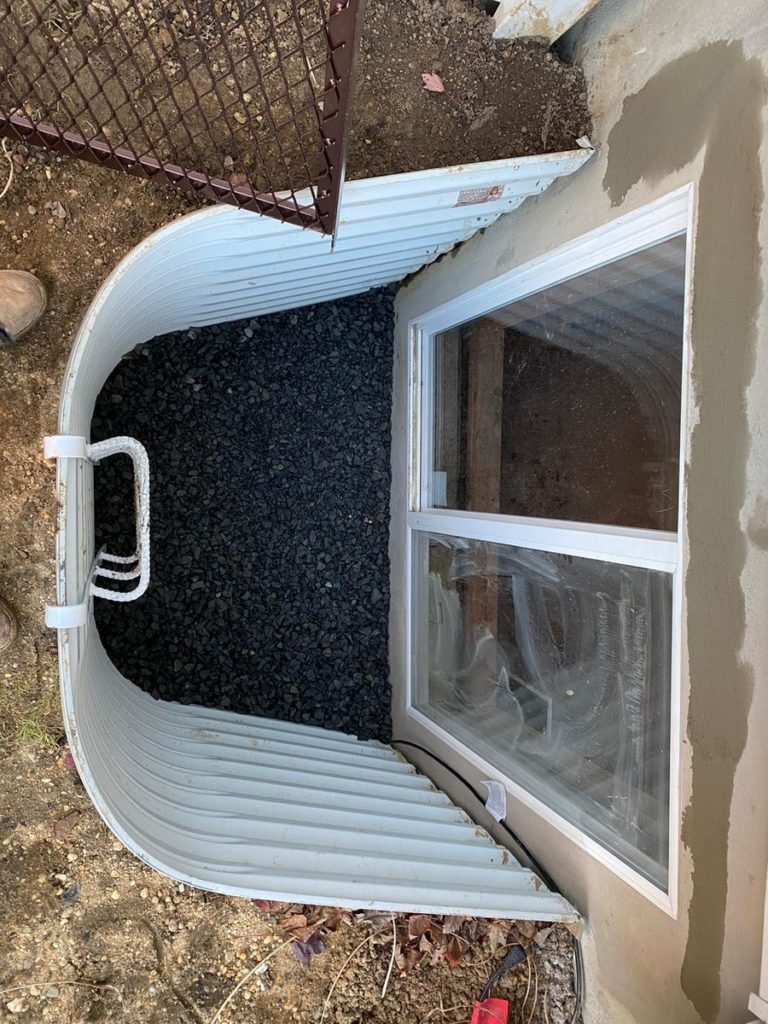 Egress window and walkout steps with pumps completed in Toms River NJ