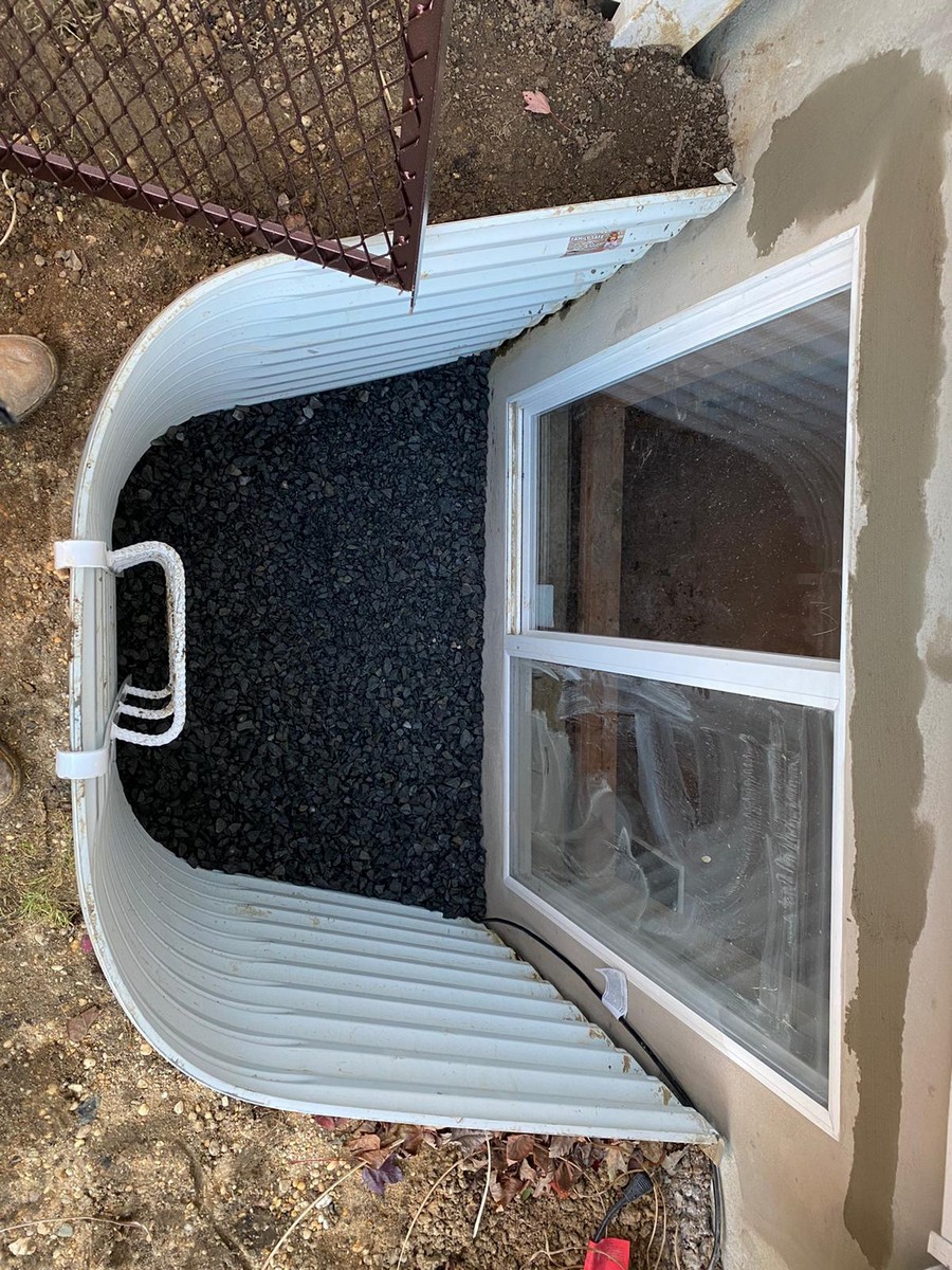 Egress window and walkout steps with pumps completed in Toms River NJ