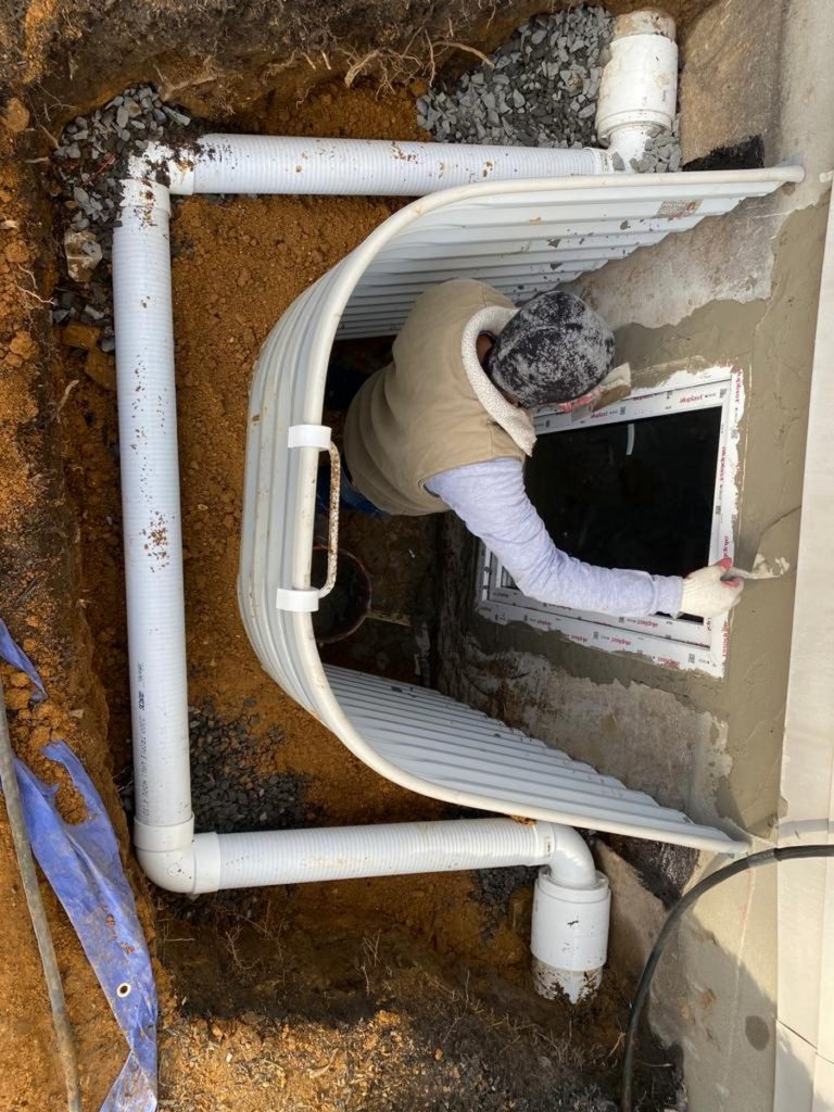 Egress window installed in Chester NJ with new drain pipe