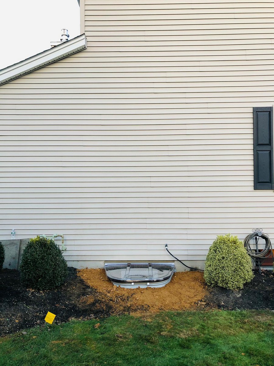 Egress window installed in Chester NJ with new drain pipe